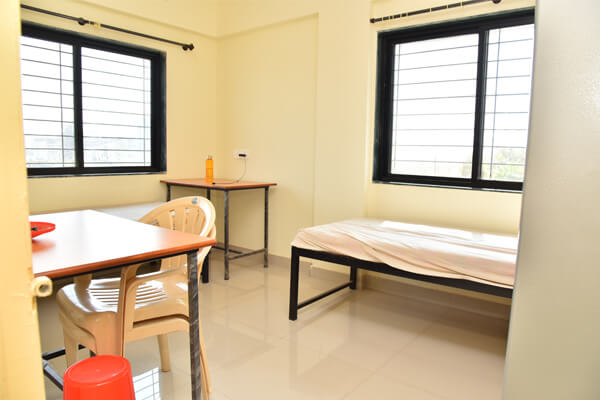 The PCACS college has a huge library, Reading Hall, and dormitories ...